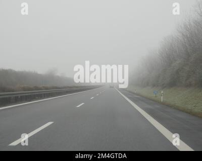 Highway in fog German Autobahn Stock Photo - Alamy