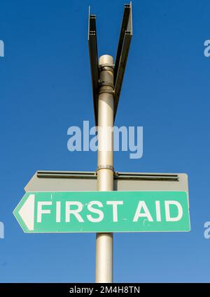 First Aid Sign Attached To Lamppost Stock Photo - Alamy