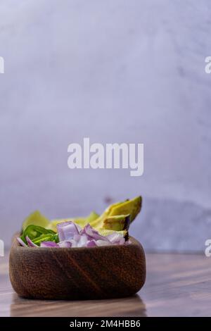 avocado, onion and cilantro, to accompany meat in its juice, typical ...