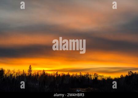 Sunset skies, beaver pond at freeze-up, Greater Sudbury, Ontario ...