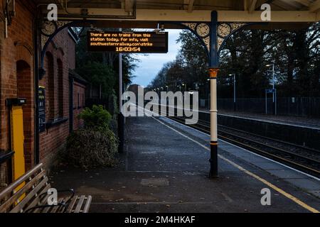 Claygate, UK. 21st Dec, 2022. a deserted train line and station as ...