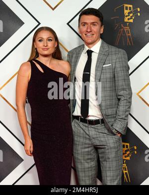 Jake Wightman and Georgie Hartigan pose on the red carpet prior to the ...