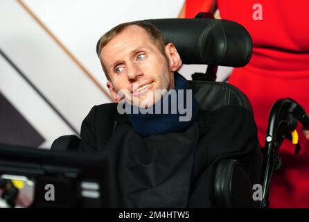 Rob Burrow poses on the red carpet with wife Lindsey and daughters ...
