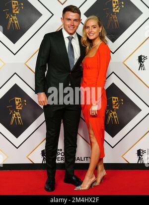 Sam Curran and partner Isabella Symonds Willmott pose on the red carpet ...