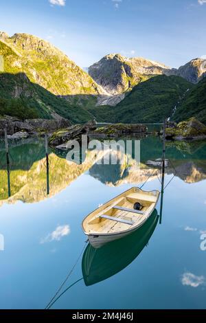 Glacial lake Bondhusvatnet with rowing boat, Bondhusdalen, Bondhusbreen ...