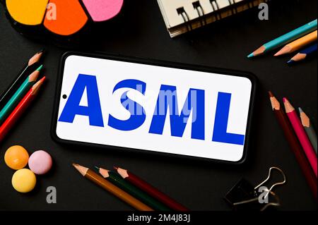 In this photo illustration, the ASML logo is seen displayed on a ...
