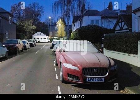 Cars parked along roads around Teddington are covered in frost. Image ...