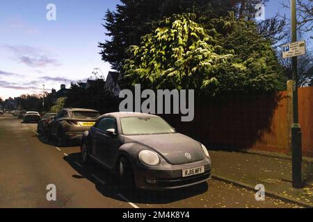 Cars parked along roads around Teddington are covered in frost. Image ...