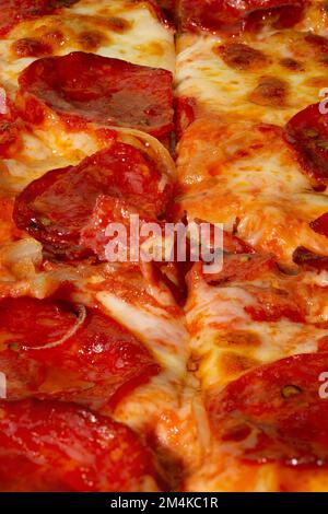 Pizza background - macro shot of pizza with onion, pepper and cheese ...