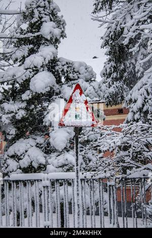 Snow covered traffic light and trees near town of Banff, Canadian ...