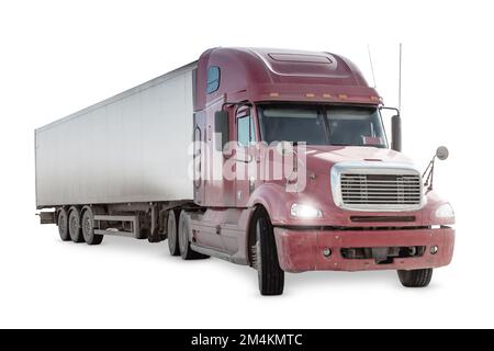 Red long-distance bonnet truck with a white semitrailer on bright ...