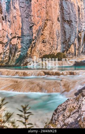 Natural pools of Millpu in Huancaraylla. Turquoise lagoons near ...