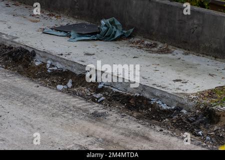 Concrete rubble in a ditch on a construction site Stock Photo - Alamy