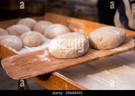 bread preparation. loaves of dough before baking Stock Photo - Alamy