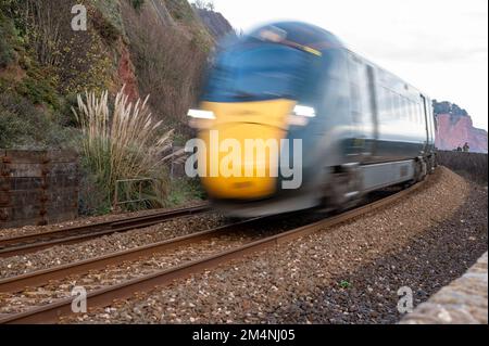 Locomotive train moving fast at Teignmouth blurred movement Stock Photo ...
