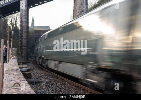 Locomotive train moving fast at Teignmouth blurred movement Stock Photo ...