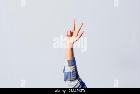 Number THREE in sign language. Deaf and dumb counting the number THREE ...