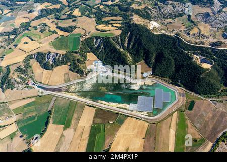 Aerial photo photovoltaics on a water retention basin in the French ...