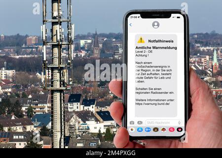 Symbolic image Cell broadcast, warning service via mobile phone, by SMS ...