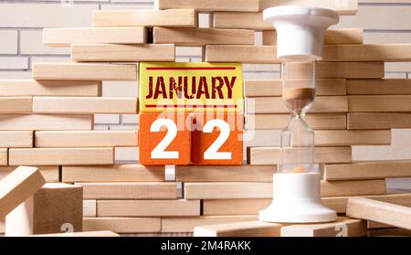 January 22 calendar date text on wooden blocks with blurred background ...