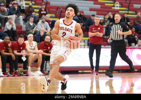 Colgate guard Braeden Smith (2) drives past Texas guard Tyrese Hunter ...