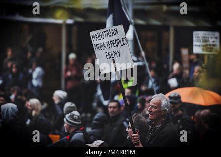An aerial view of carrying signs in a freedom protest in Melbourne ...