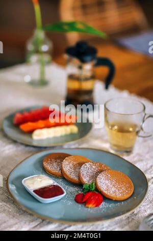 Close-up of pancake with strawberries arranged in plate at cafe Stock ...