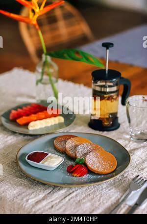 Close-up of pancake with strawberries arranged in plate at cafe Stock ...