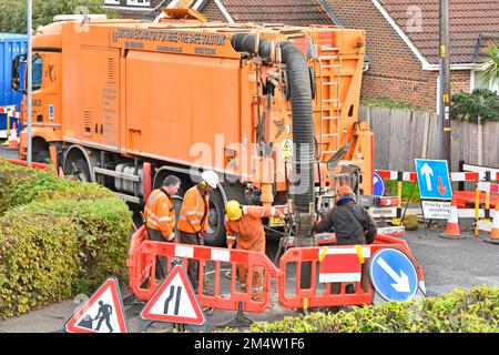 Gas street main renew & trench across house drive contractor equipment ...