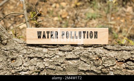 Pollution word. Background log written on wooden frame. Nature and life ...