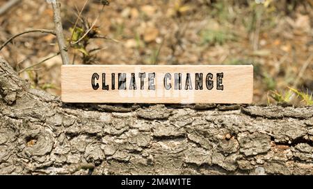 Global warming word. Background log written on wooden frame. Nature and ...