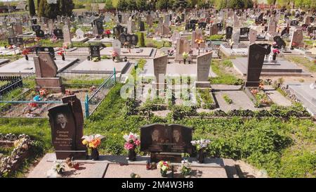 Drone flight over the graves of the cemetery Stock Photo - Alamy