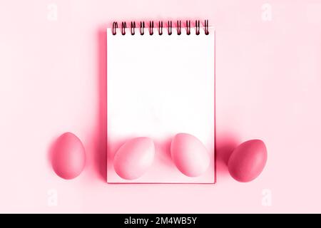 Notebook with Easter Eggs. Spiral notepad on spring white background ...