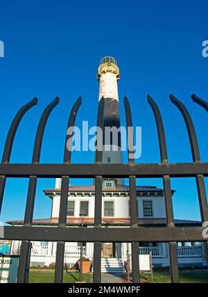 house behind the fence with the skies Stock Photo - Alamy