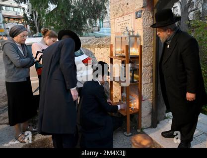 Ultra-Orthodox Jewish family light candles in the fifth night of ...
