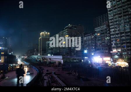 Kairo, Egypt. 12th Nov, 2022. People walking across a bridge over the ...