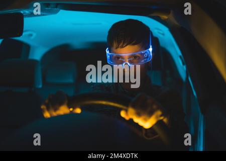 Woman wearing smart glasses driving car Stock Photo - Alamy