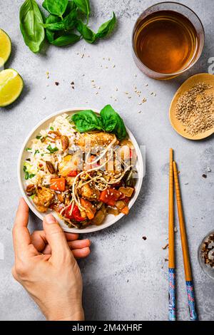 Personal perspective of woman picking up plate of zucchini and ricotta ...