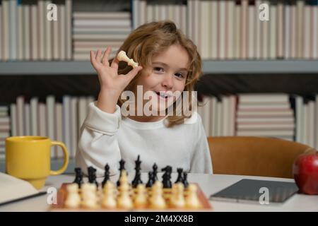 Chess game for children. Shool kid playing chess in classroom. Brain ...