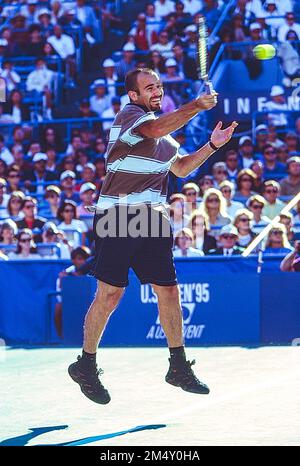 Andre Agassi (USA) competing at the 1995 US Open Tennis Stock Photo - Alamy