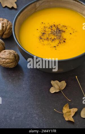 Autumnal composition with dried leaves and delicious creamy homemade ...