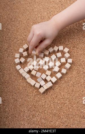 Valentine's Day. Picture in the form of heart. Two red cups of coffee ...