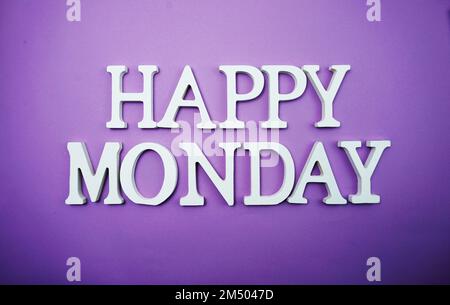 Happy Monday wooden letter alphabet with dried flower on blue ...