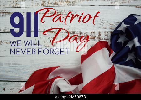 911 Patriot Day message with American flag on wooden background Stock ...