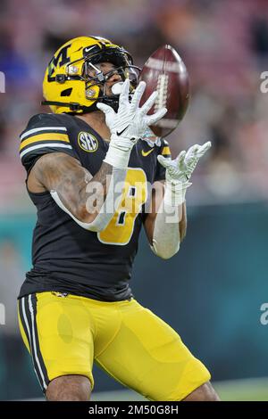 Tampa Bay, FL USA; Missouri Tigers quarterback Brady Cook (12) runs ...