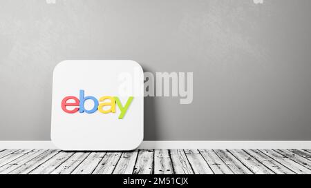 Ebay App Icon on Wooden Floor Against Wall Stock Photo - Alamy