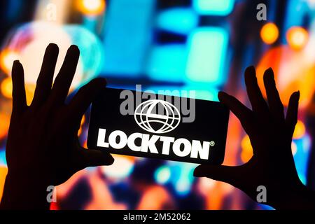 In this photo illustration, the Lockton Companies Inc. logo is ...