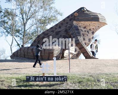 A giant Bullfrog Bonfire is displayed on the levee in Garyville ...