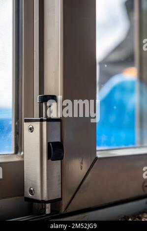 Handle, locking hardware, and jam to a sliding glass and screen door ...