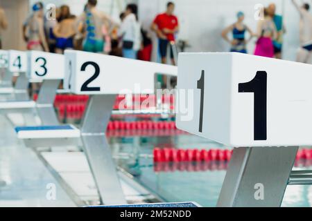 Starting table with numbers for diving in Olympic pool. Swimming pool ...